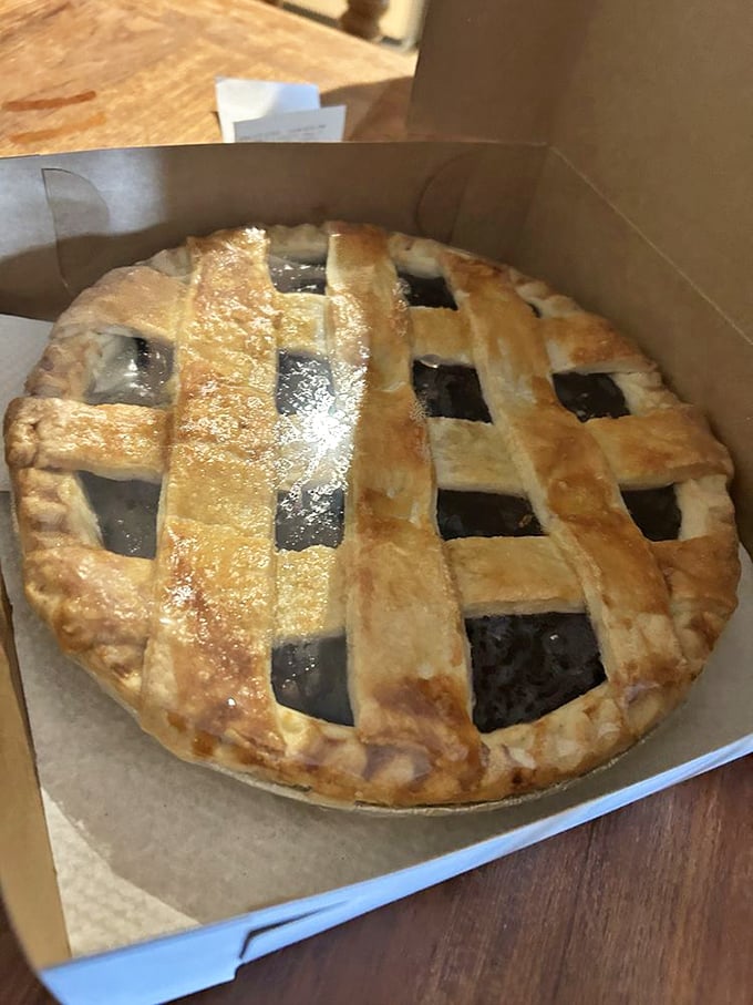 Lattice-top pies aren't just desserts—they're edible architecture. This blueberry masterpiece is what your diet cheat day has been dreaming about.