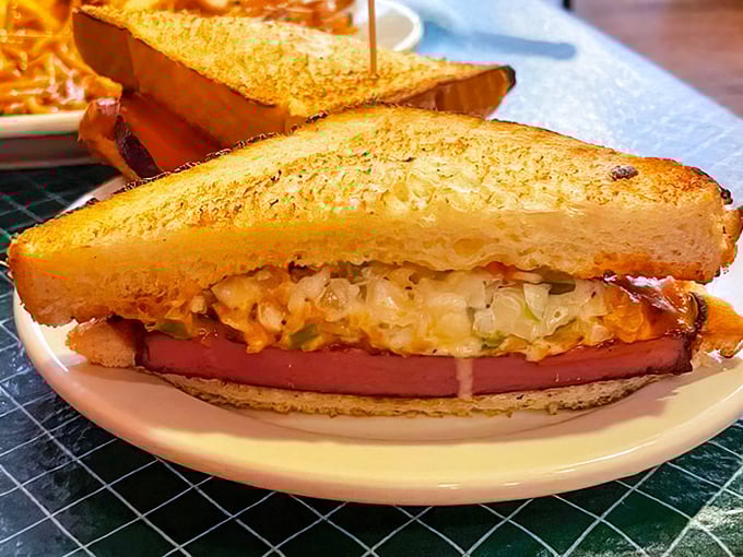 The Texas toast sandwich – golden, buttery bread embracing a colorful medley of fillings. A handheld masterpiece that requires both hands and several napkins.