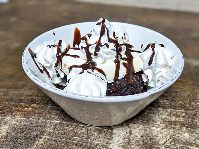 This brownie sundae isn't just dessert—it's therapy in a bowl. Warm chocolate, cool cream, and chocolate drizzle forming the holy trinity of comfort.