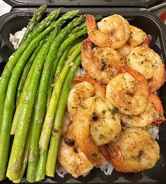 Butter garlic shrimp that glistens like treasure in a sea of savory sauce. Proof that sometimes the simplest combinations create the most profound flavors.
