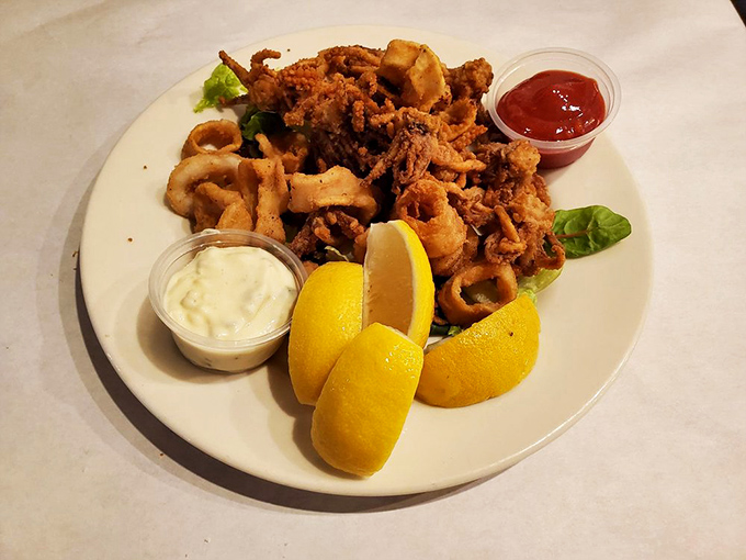 Fried calamari that ruins you for all other calamari. Crispy, tender, and served with enough lemon to make your taste buds dance.