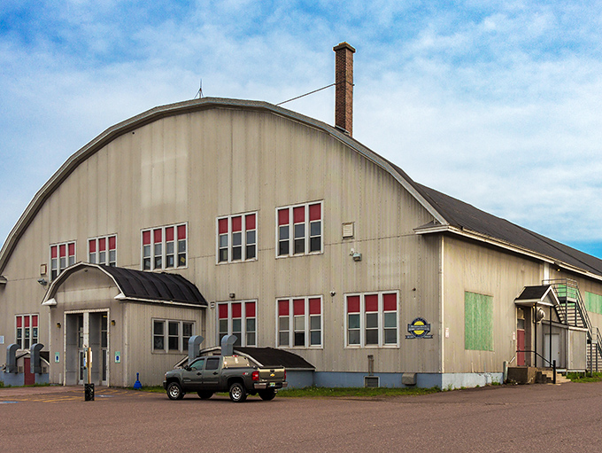 The Calumet Colosseum looks like it's seen more hockey fights than a dentist's retirement fund. That curved roof has sheltered generations of winter warriors.