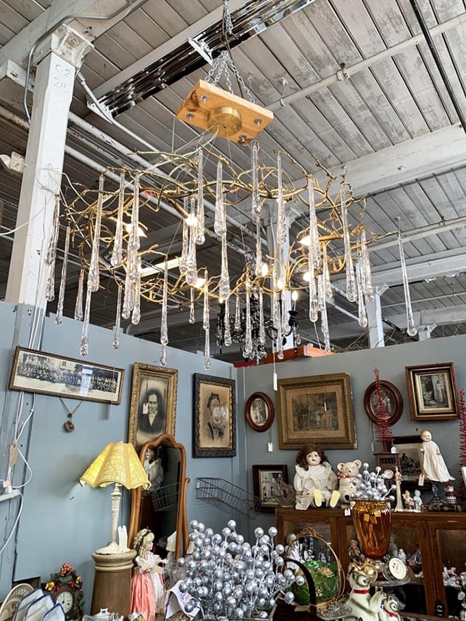 Dripping with crystal elegance, this chandelier hangs like a frozen waterfall. Imagine this beauty illuminating your dining room—instant glamour from another era!