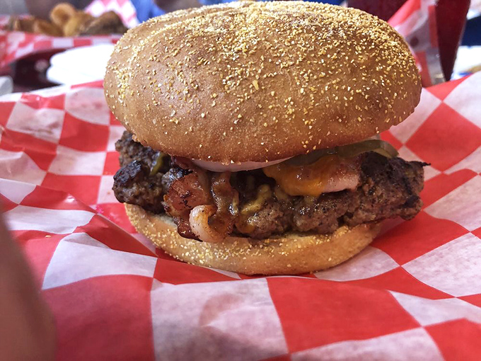 Not just any burger—a proper, hand-formed masterpiece with toppings that complement rather than overwhelm. This is burger artistry at work.