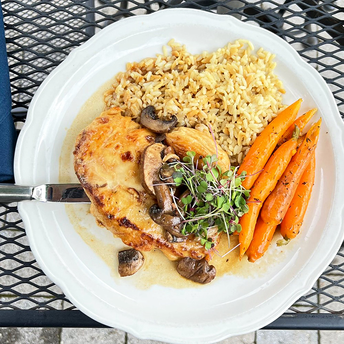 Chicken marsala that's having a moment with mushrooms and carrots—a plate that proves comfort food can also be photogenic.