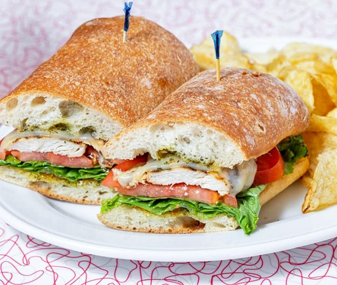 This sandwich doesn't just satisfy hunger—it eliminates it. Crispy chicken, fresh vegetables, and bread that deserves its own fan club.