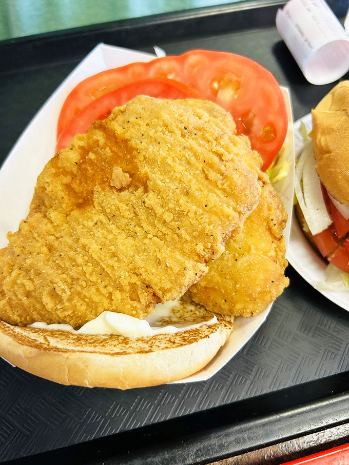 That's not just a chicken sandwich—it's a golden-crusted behemoth that makes other fast food chicken look like it skipped leg day.