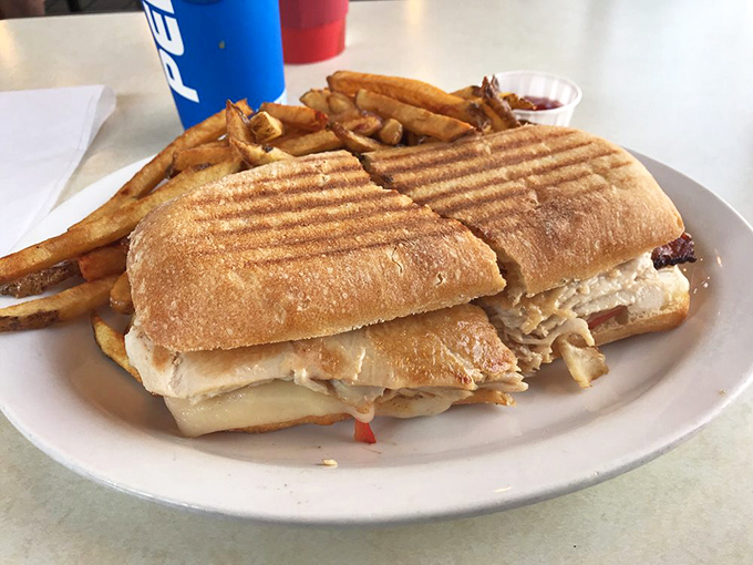 This panini isn't messing around – grilled to perfection with layers of flavor that would make any Italian nonna nod in approval.