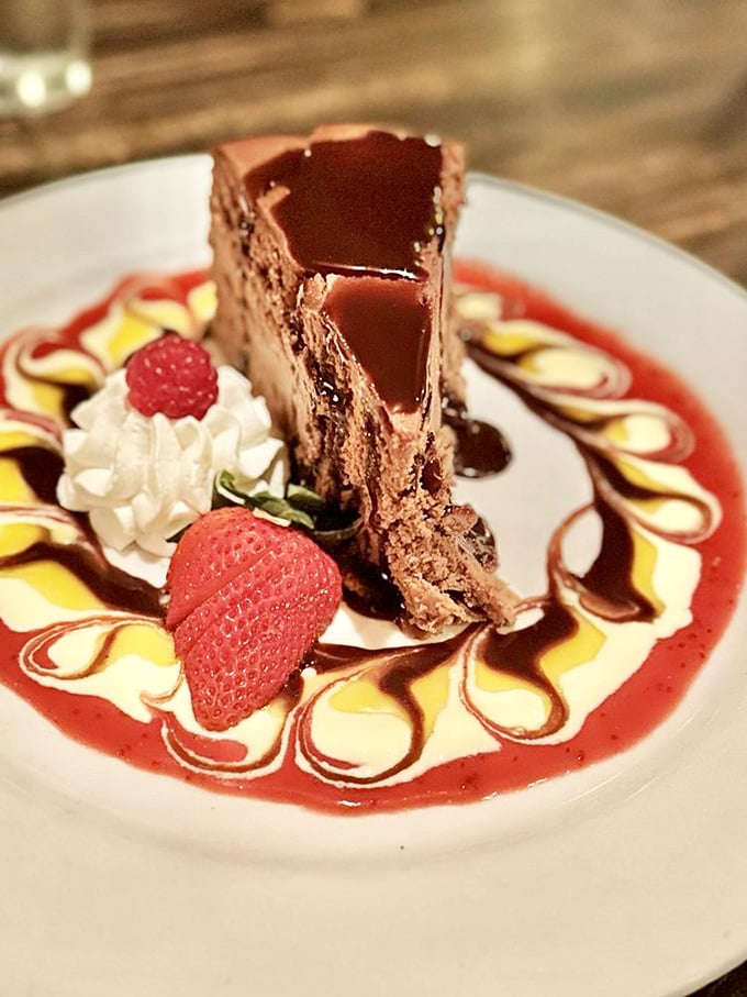 This chocolate cheesecake doesn't just end your meal – it provides closure, therapy, and a moment of silent gratitude for whoever invented dessert.