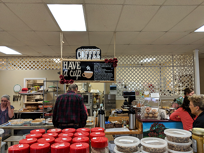 The coffee counter—where morning dreams come true and caffeine meets craftsmanship. Like the United Nations of breakfast, bringing people together one cup at a time.