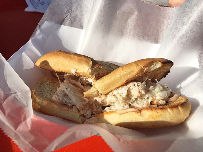A crab sandwich that doesn't hide behind fancy garnishes. Just pure, sweet Dungeness on toasted bread—the seafood equivalent of a perfect sunset.