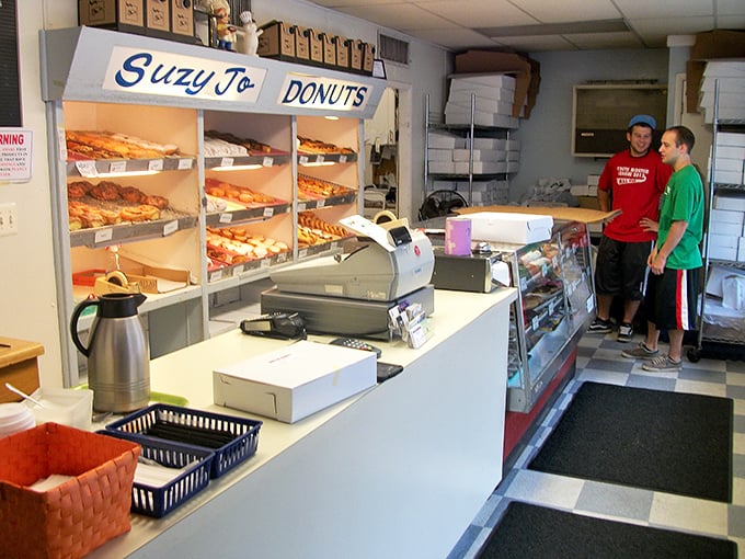The interior speaks volumes: no-nonsense, all-business, and completely focused on what matters—getting fresh donuts into hungry hands.