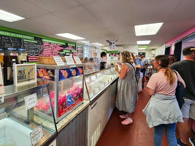 The line forms as ice cream pilgrims wait their turn at the dairy altar. Some journeys are measured in miles, others in scoops.