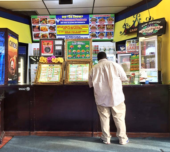 The ordering counter – where chicken dreams come true. Worth every minute of that 45-minute wait they warn you about.