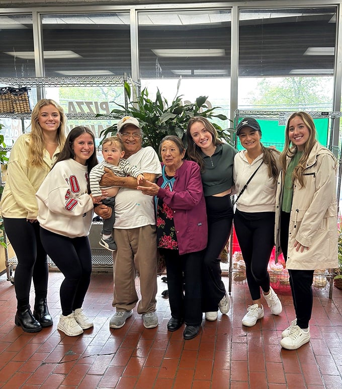 Generations gather at Auddino's, where family traditions are baked into every visit. The real secret ingredient? The people who keep coming back.