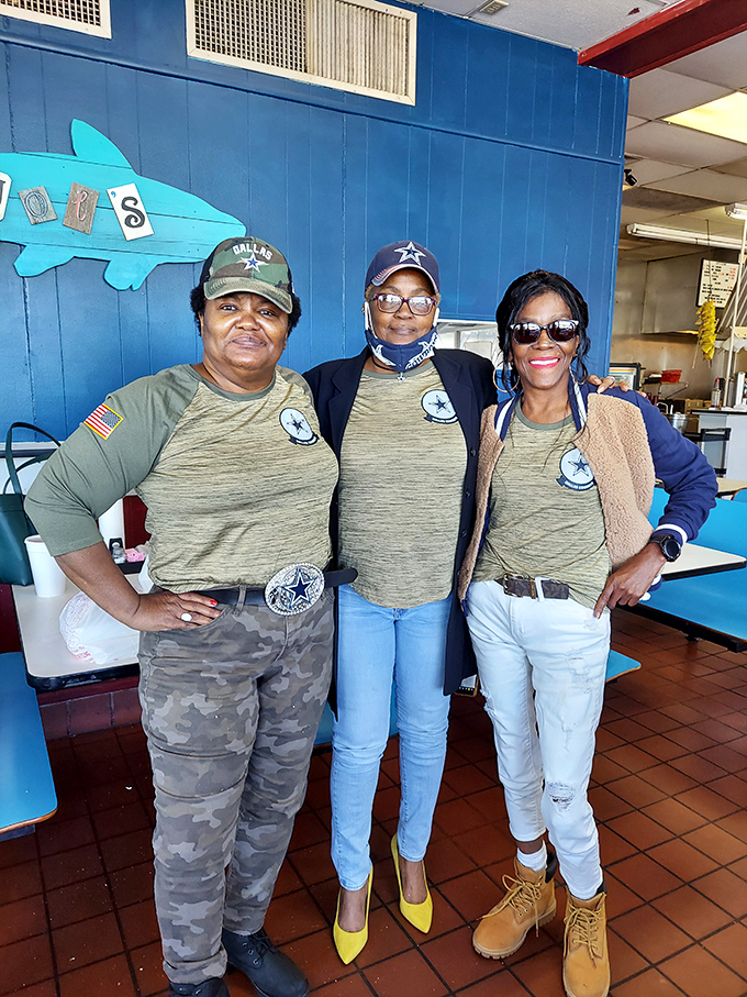 The heart of Joe's—staff sporting matching Dallas Cowboys gear and smiles that say "we know our food is about to make your day."
