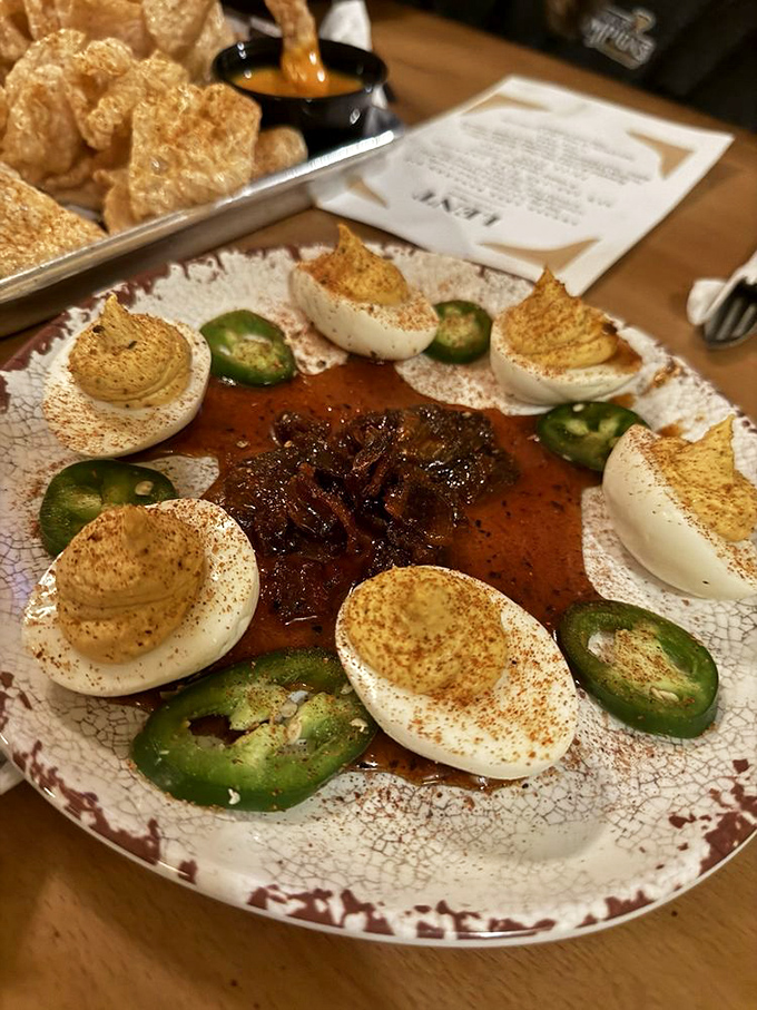 Deviled eggs elevated to art form—spiced, smoked, and surrounded by jalapeños. Grandma's recipe just got a smoky makeover that would make the devil proud.