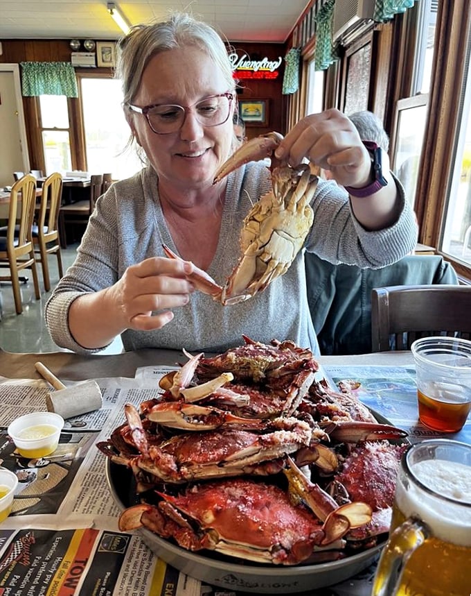 The sacred ritual of crab picking—where patience and technique are rewarded with sweet, delicate meat worth every minute of effort.