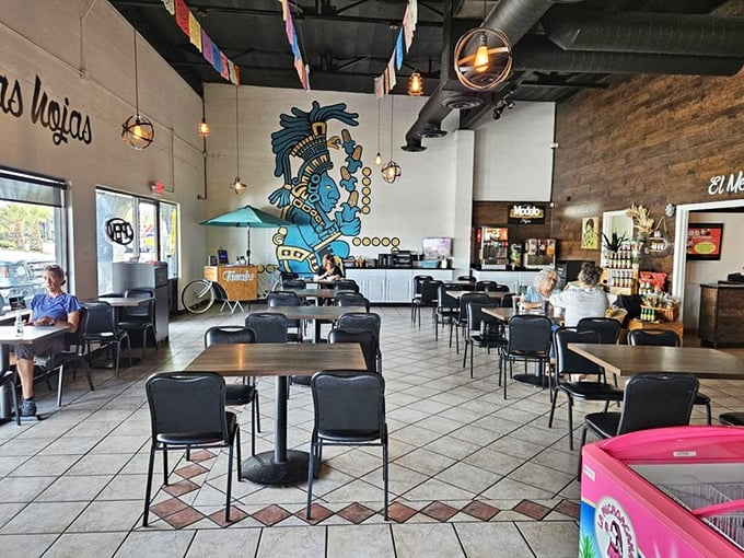 The dining room invites lingering conversations and second helpings, with that magnificent mural standing guard over your meal.