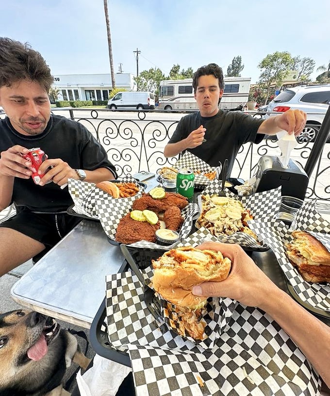 The outdoor feast that says it all—multiple baskets, multiple heat levels, and expressions that perfectly capture the "first bite of something extraordinary" moment.