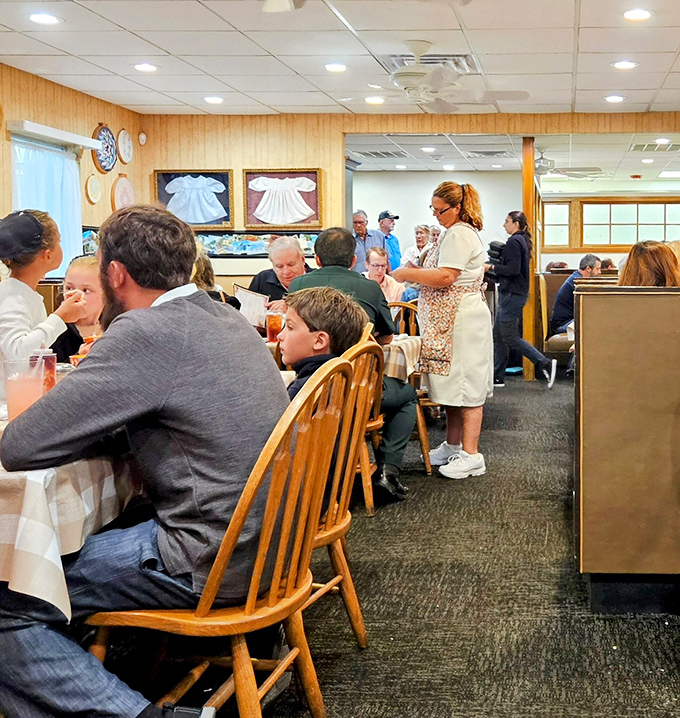 The dining room hums with the universal language of "mmm" as families gather around tables for meals worth remembering. No phones necessary—the food demands full attention. 
