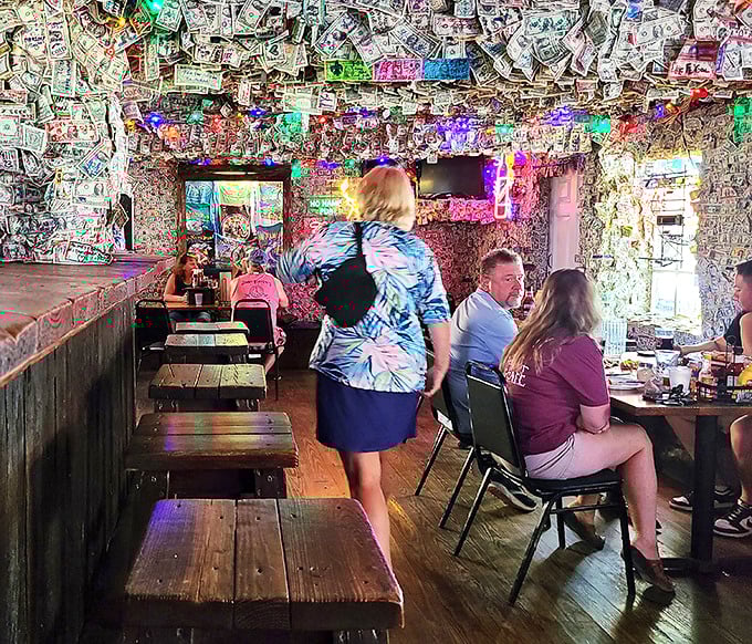 Where strangers become friends under a ceiling of memories – each dollar bill representing someone who, like you, was delighted they "found it."