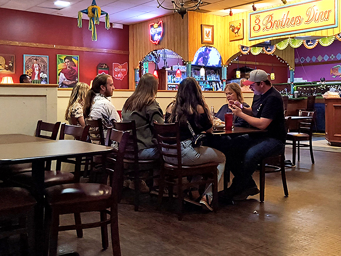 The true measure of any great diner isn't just the food—it's the conversations happening around those wooden tables and red booths.