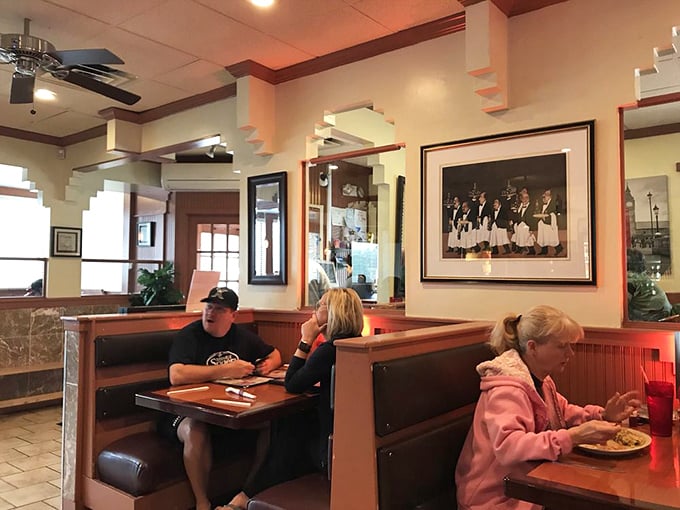 Booths designed for comfort and conversation—where locals solve world problems over pancakes and endless coffee refills.