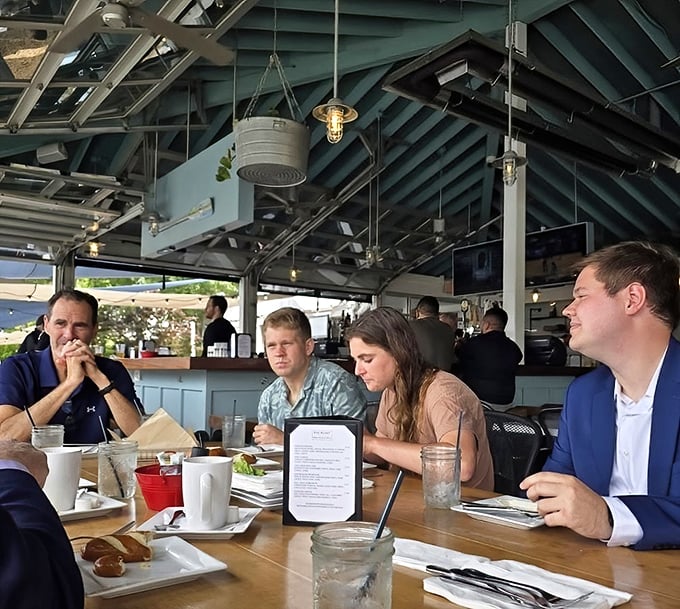 The indoor-outdoor design means you're never far from that million-dollar marina view, even when Maryland weather has other plans.