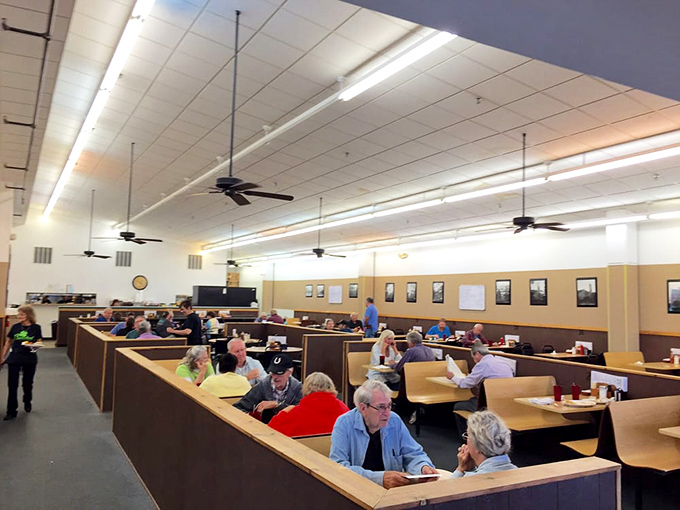 The dining room hums with the symphony of forks against plates and coffee cups meeting saucers. Every booth tells a story.