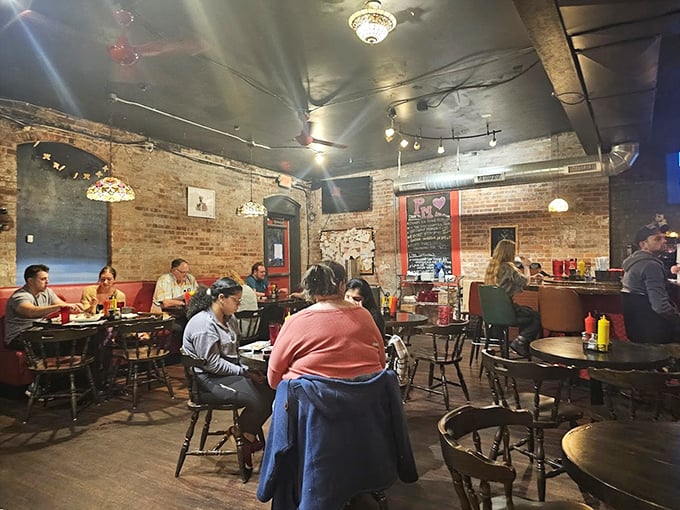 Every table tells a story, and every plate empties quickly. The buzz of conversation is just the sound of people falling in love with their food.