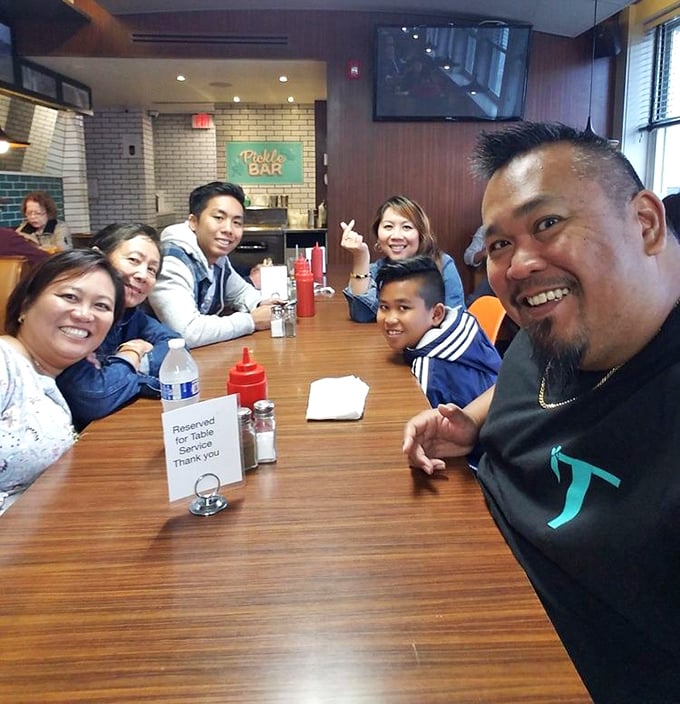 Happy faces around the table – the universal language of "we ordered way too much and regret nothing."