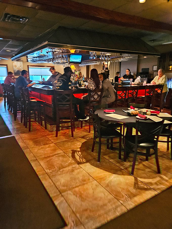 The bar area hums with that perfect blend of energy and comfort—where strangers become friends and friends become regulars.
