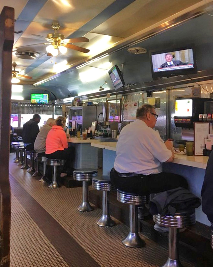 The counter crew—Maryland's morning philosophers and news analysts—perched on swivel stools that have heard every local story worth telling.