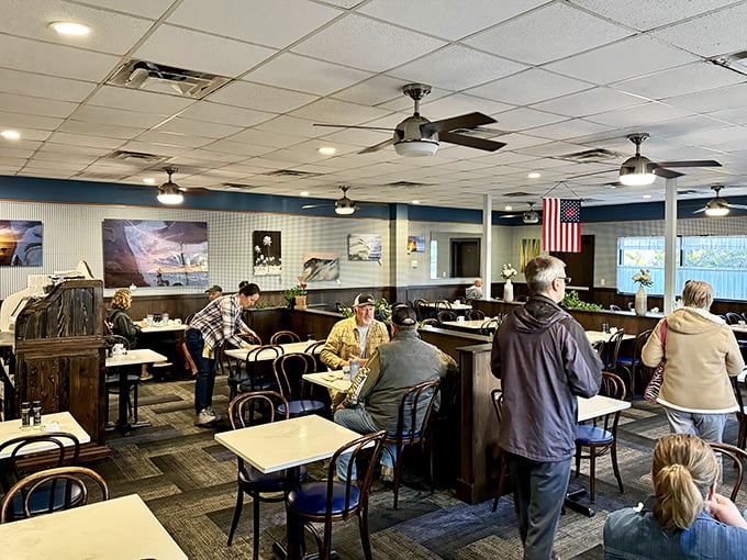 The dining room – where strangers become friends over coffee refills and shared appreciation for perfectly cooked eggs.