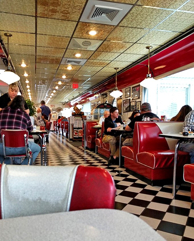 Every booth tells a story, every table holds memories—the dining room hums with conversation like a perfectly orchestrated small-town symphony.