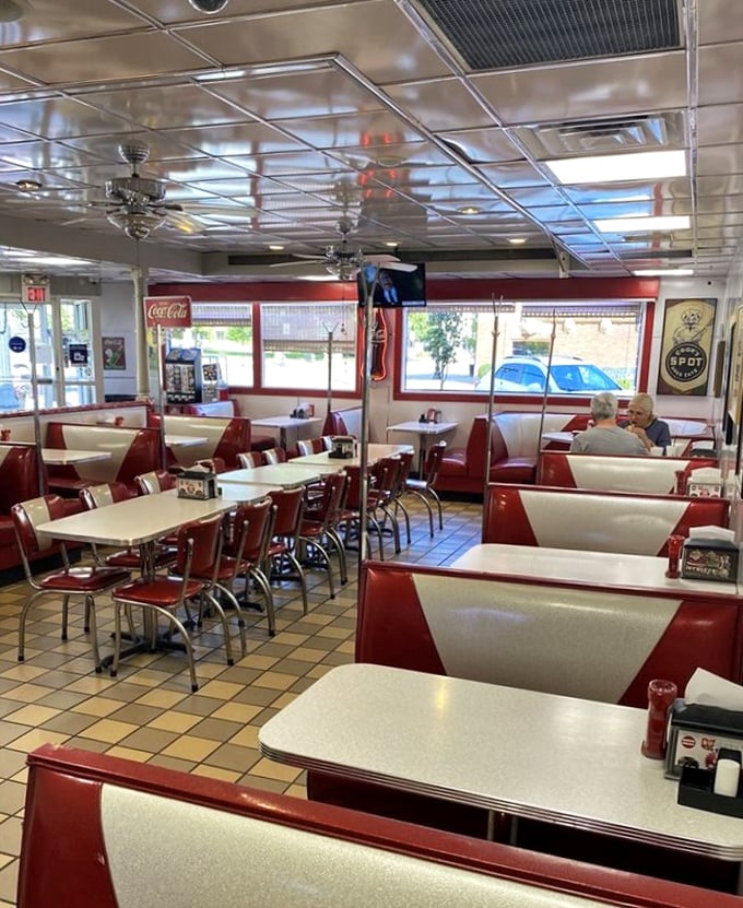 Some restaurants manufacture retro charm; The Spot simply preserved it—these tables have hosted first dates, family celebrations, and everyday meals for decades.
