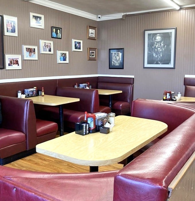 The burgundy booths have witnessed countless first dates, family celebrations, and morning-after recovery missions. If these seats could talk…