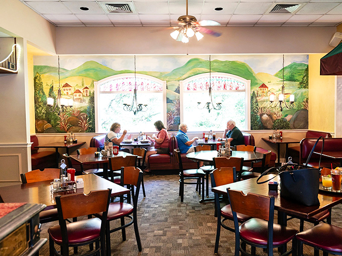 The dining area's mural transforms an ordinary meal into a Tuscan getaway, no passport required—just bring your appetite.