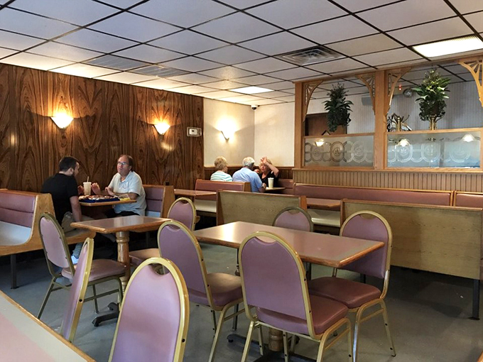 The dining room whispers stories of first dates, family celebrations, and Tuesday night dinner escapes from decades of Dayton life. 
