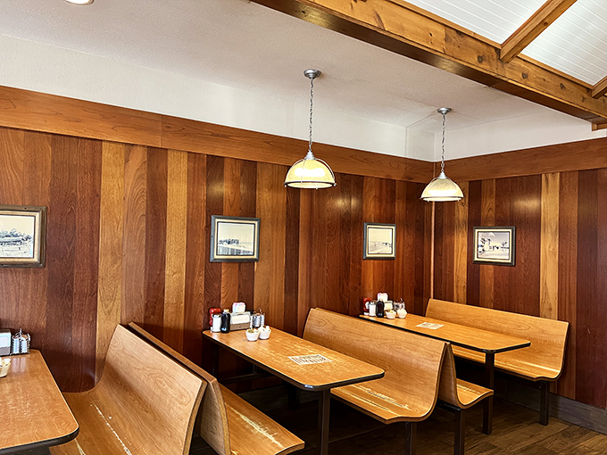 These wooden booths have witnessed countless vacation plans, business deals, and first dates. If they could talk, they'd probably just say "order the omelet."