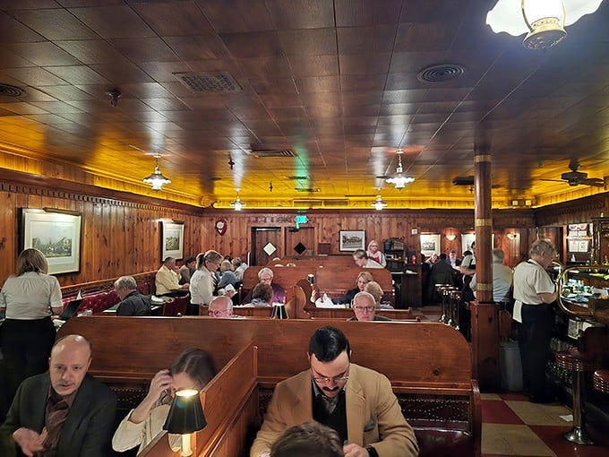 The dining room hums with anticipation and satisfaction. Generations of special occasions have unfolded under these ceiling fans.