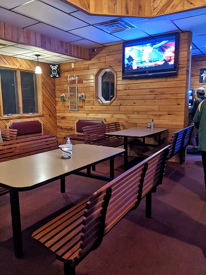 Wood-paneled walls and comfortable seating create the perfect backdrop for conversations that stretch long into the evening, just as they should.