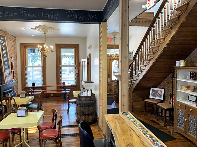 Wooden beams, exposed brick, and a staircase that's seen history unfold—all while smelling perpetually of smoked meat paradise.