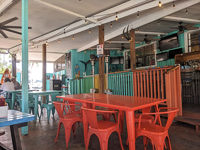 Colorful chairs that match the vibrant food. This isn't interior design – it's a mood declaration that says "serious food, zero stuffiness."