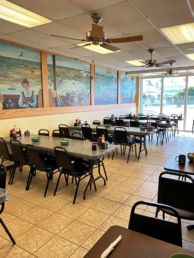 Colorful Keys-inspired murals watch over diners like old friends. The ceiling fans keep the conversation flowing as easily as the coffee.