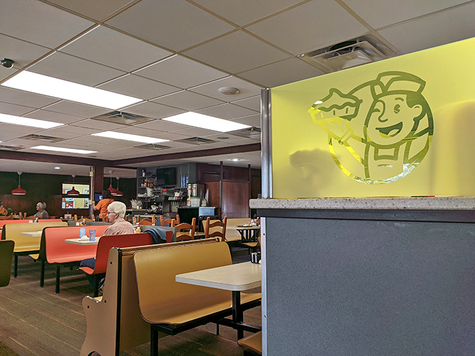 The cheerful chef logo watches over diners like a benevolent spirit. He knows you'll be back—they always come back.