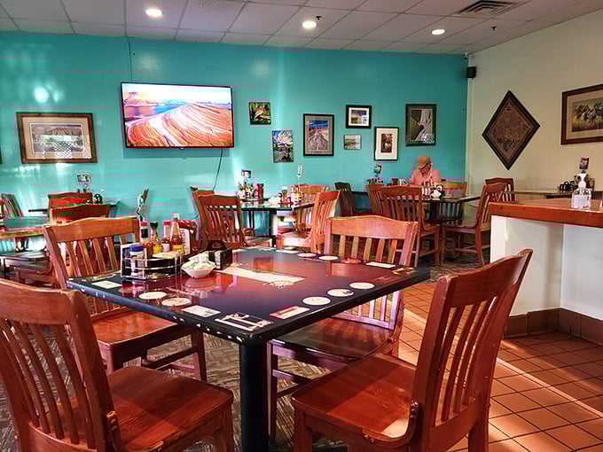 Turquoise walls and wooden chairs create the quintessential Southwestern diner atmosphere—where food comes without pretense and conversations flow like coffee.