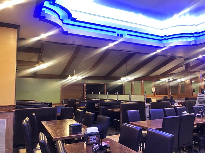 The dining area's blue glow creates an underwater ambiance that perfectly complements the seafood feast awaiting your multiple return trips.