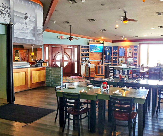 The dining area balances tropical charm with waterfront casual, creating the perfect backdrop for the "I can't believe we live here" moments Floridians occasionally have.